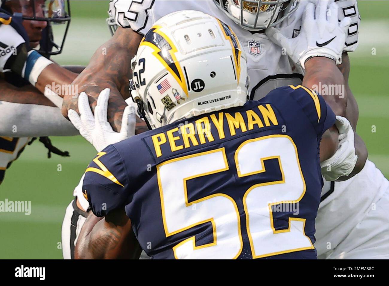 Los Angeles Chargers middle linebacker Denzel Perryman (52) wears a ...