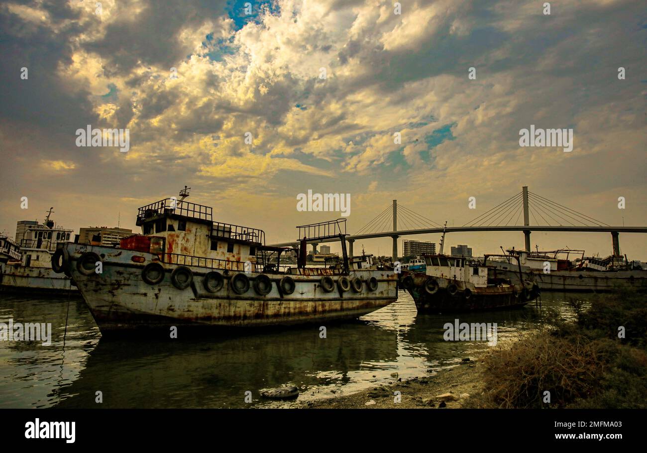 Scrapped boats wait to be recycled in Shatt al-Arab waterway near Basra ...