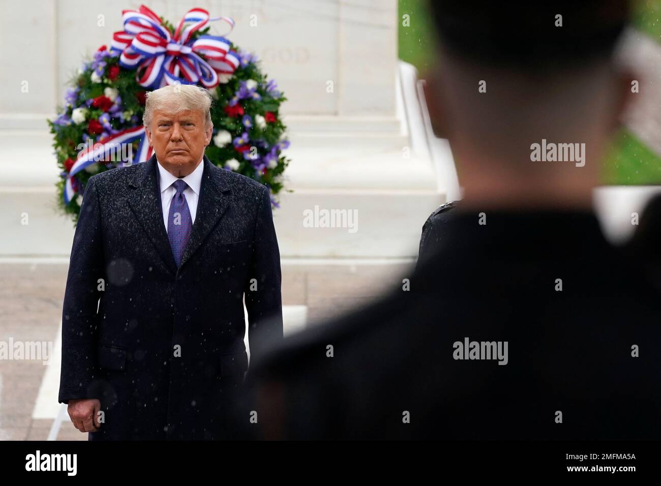 President Donald Trump participates in a Veterans Day wreath laying ...