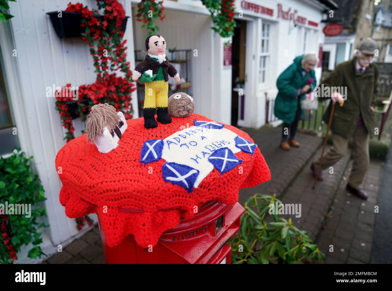 A knitted topper celebrating Burns Night placed on a post box in ... A knitted topper celebrating Burns Night placed on a post box in ...
