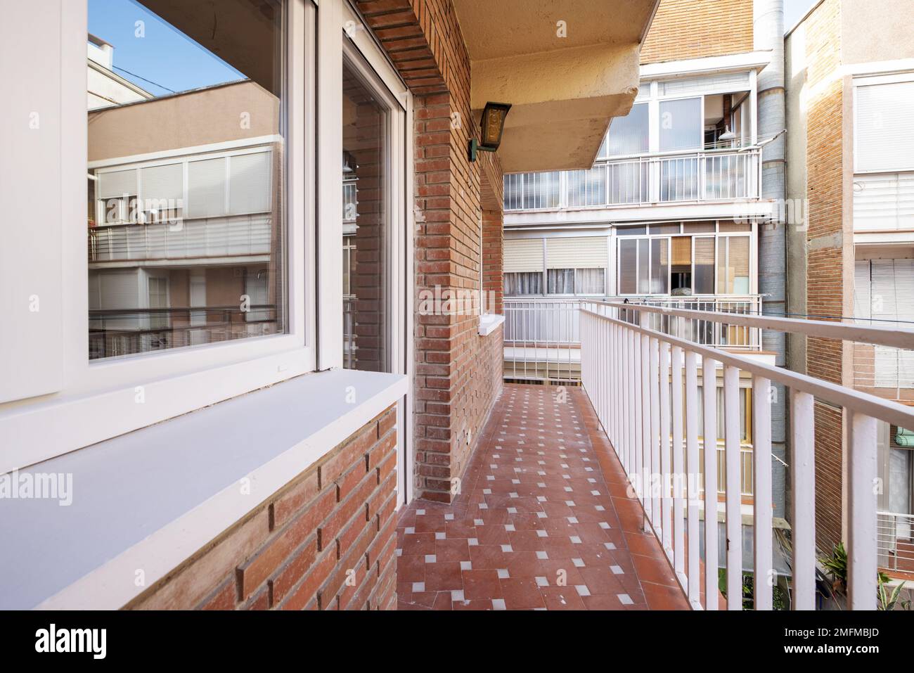 Elongated terrace of a house with clay floors, bricks of the same ...
