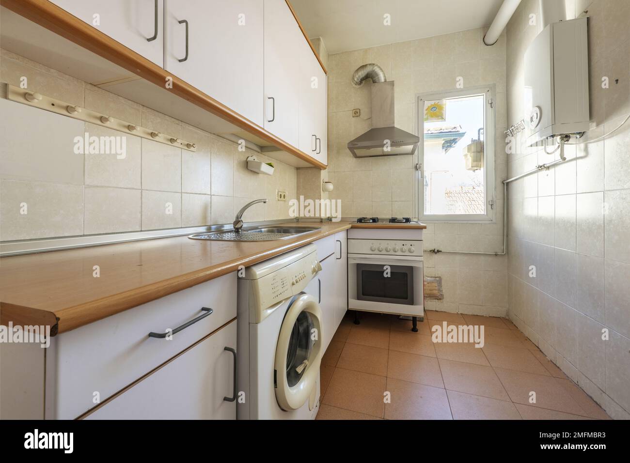 Used kitchen from a cheap apartment with natural gas boiler and gas ...