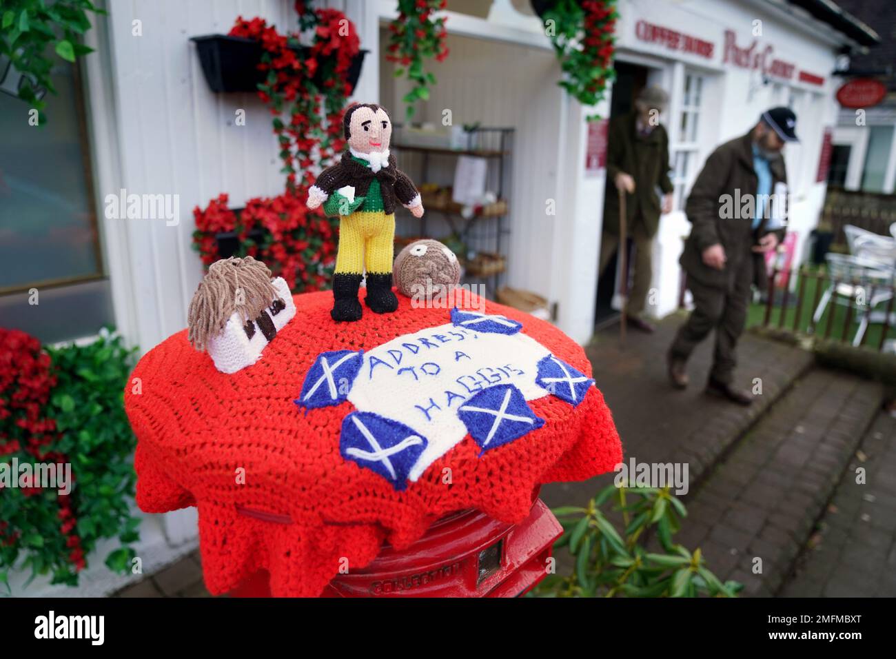 A knitted topper celebrating Burns Night placed on a post box in ... A knitted topper celebrating Burns Night placed on a post box in ...