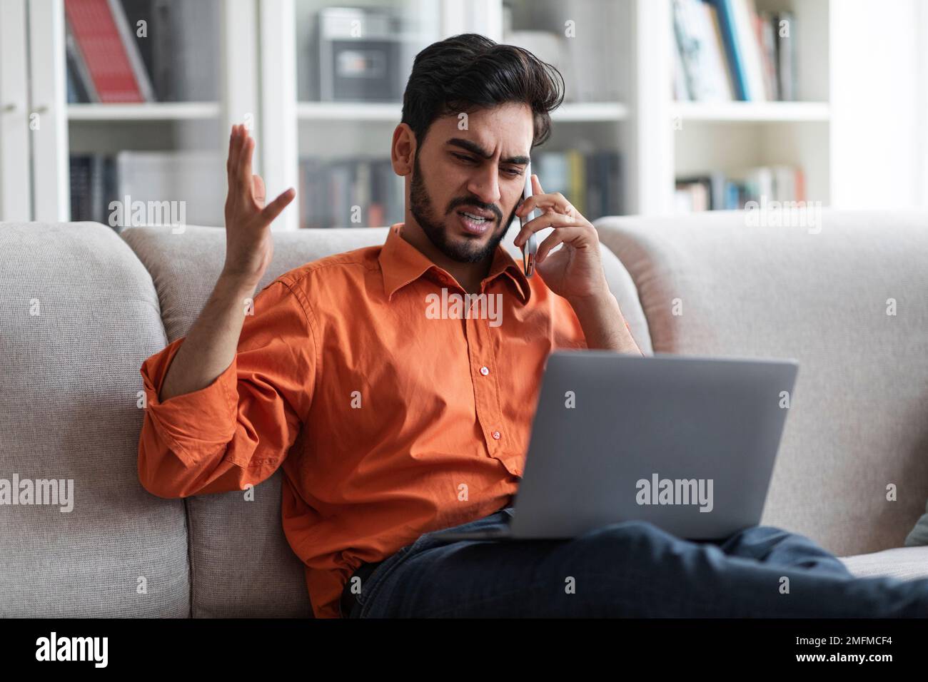 Angry handsome young businessman hi-res stock photography and images ...