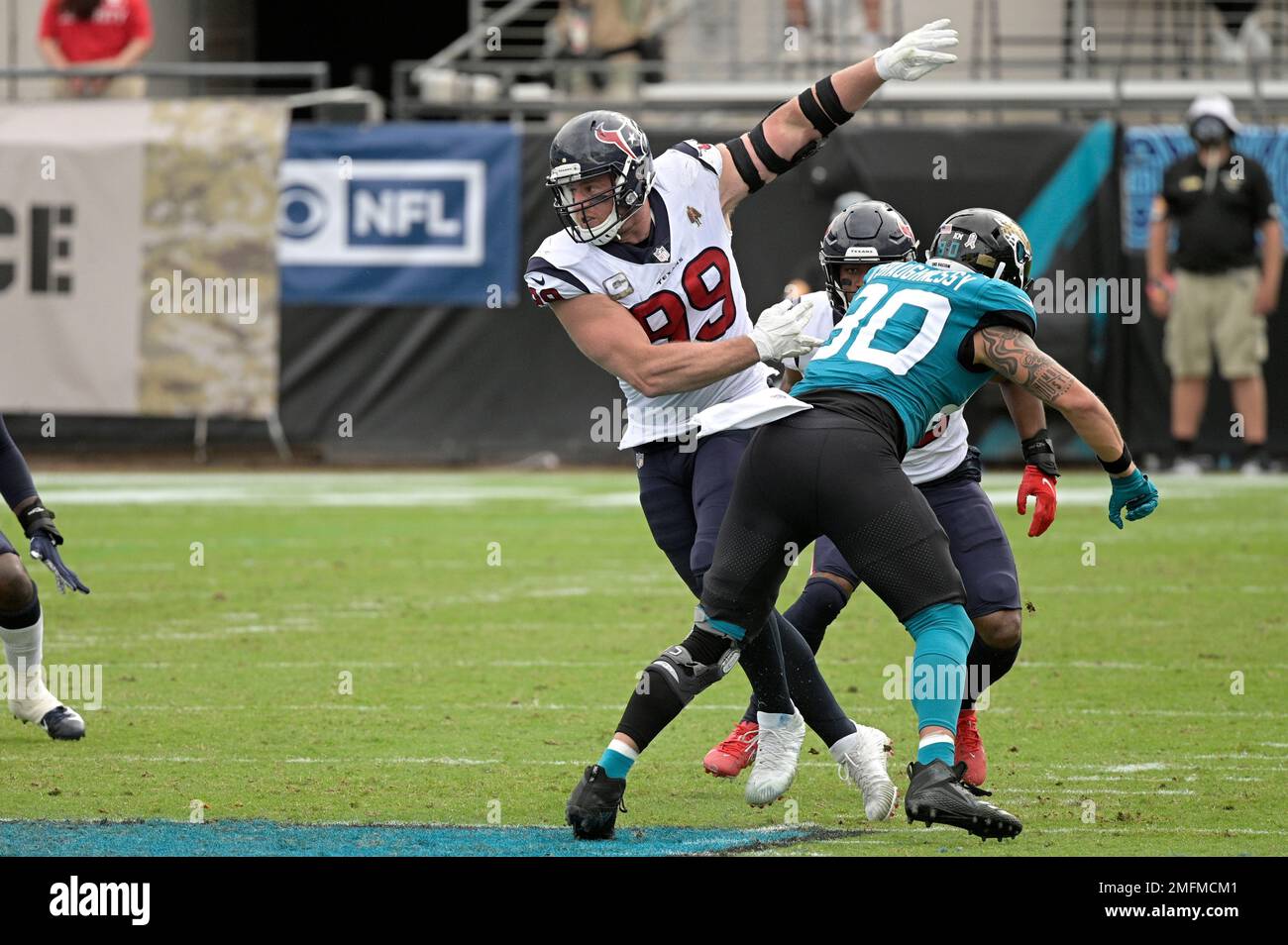 Houston Texans defensive end J.J. Watt (99) gets past Jacksonville ...