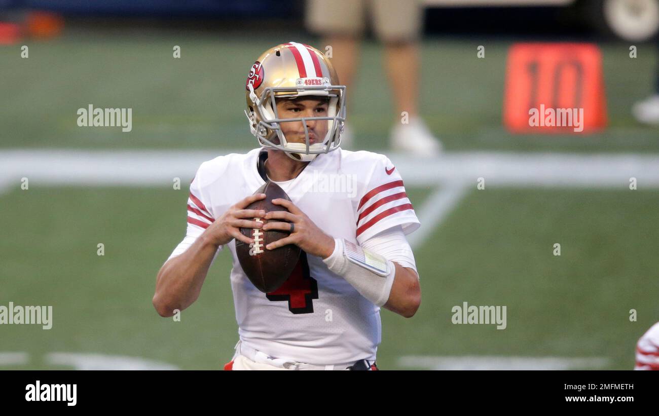 San Francisco 49ers quarterback Nick Mullens drops back to pass against ...