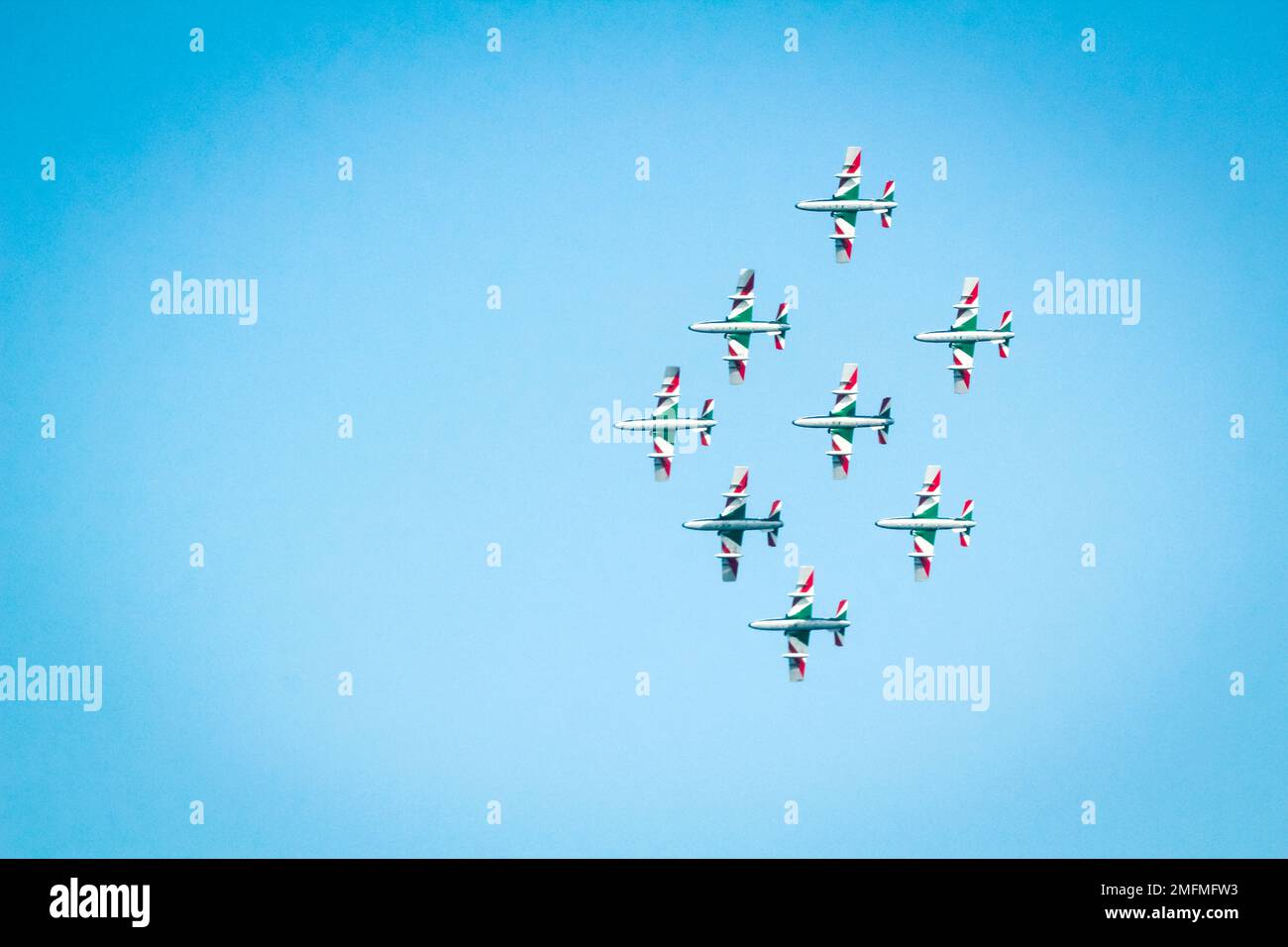 tricolor braids of the Italian military aviation, flight during an ...