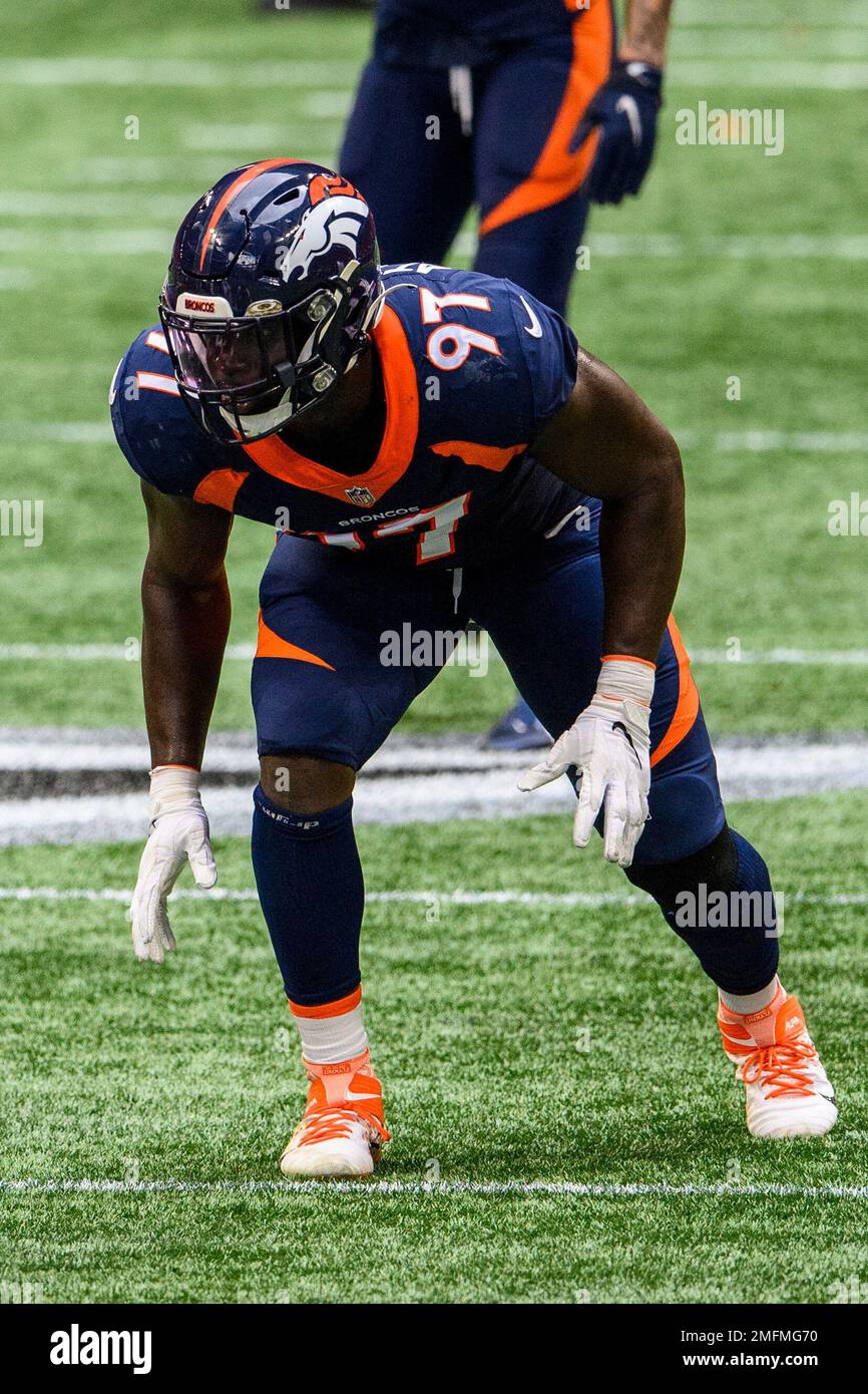Denver Broncos outside linebacker Jeremiah Attaochu (97) lines up ...