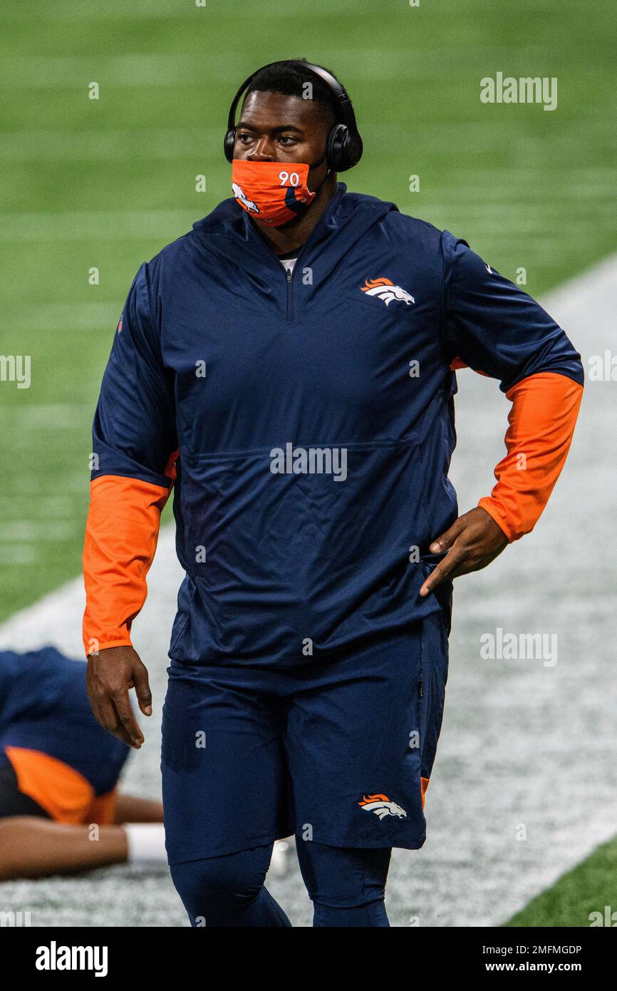 Denver Broncos defensive end DeShawn Williams (90) warms up before an ...