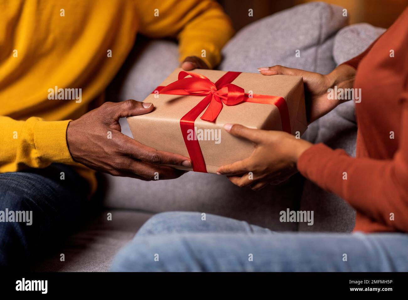 African american family exchanging hi-res stock photography and images ...