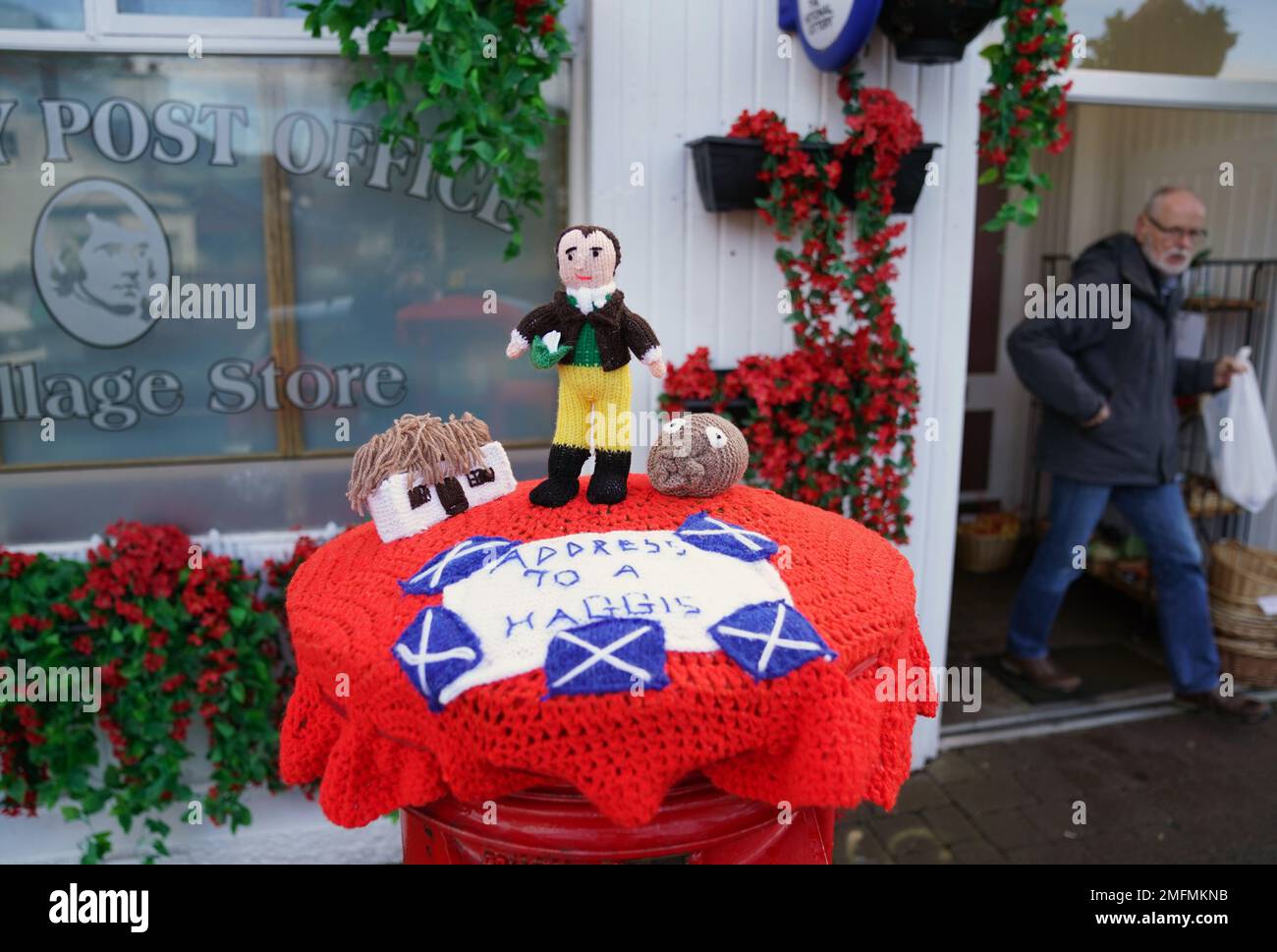 A knitted topper celebrating Burns Night placed on a post box in ... A knitted topper celebrating Burns Night placed on a post box in ...