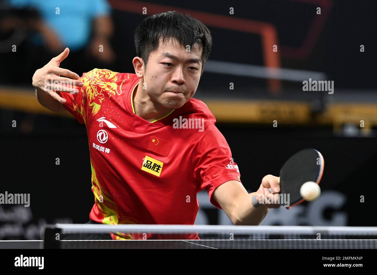 Doha, Qatar. 25th Jan, 2023. Yuan Licen of China hits a return during ...