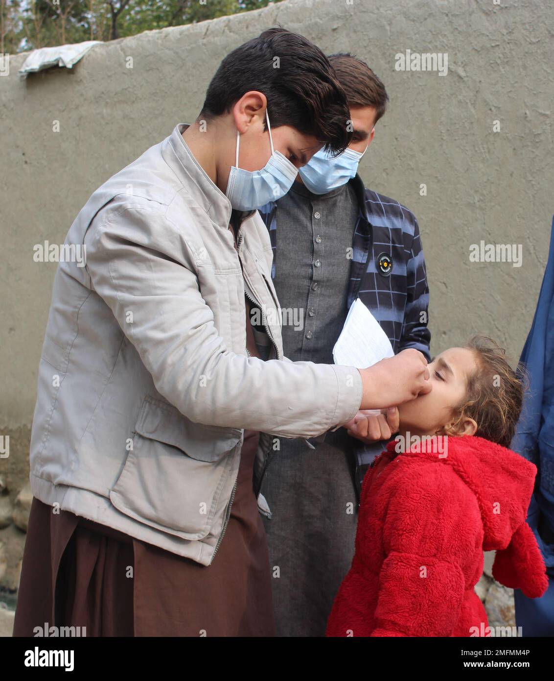 Nangarhar, Afghanistan. 24th Jan, 2023. A health worker gives a dose of ...