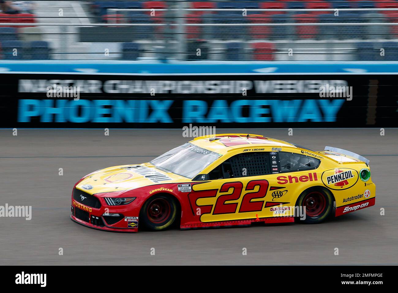 Joey Logano (22) races through Turn 4 during the NASCAR Cup Series auto ...
