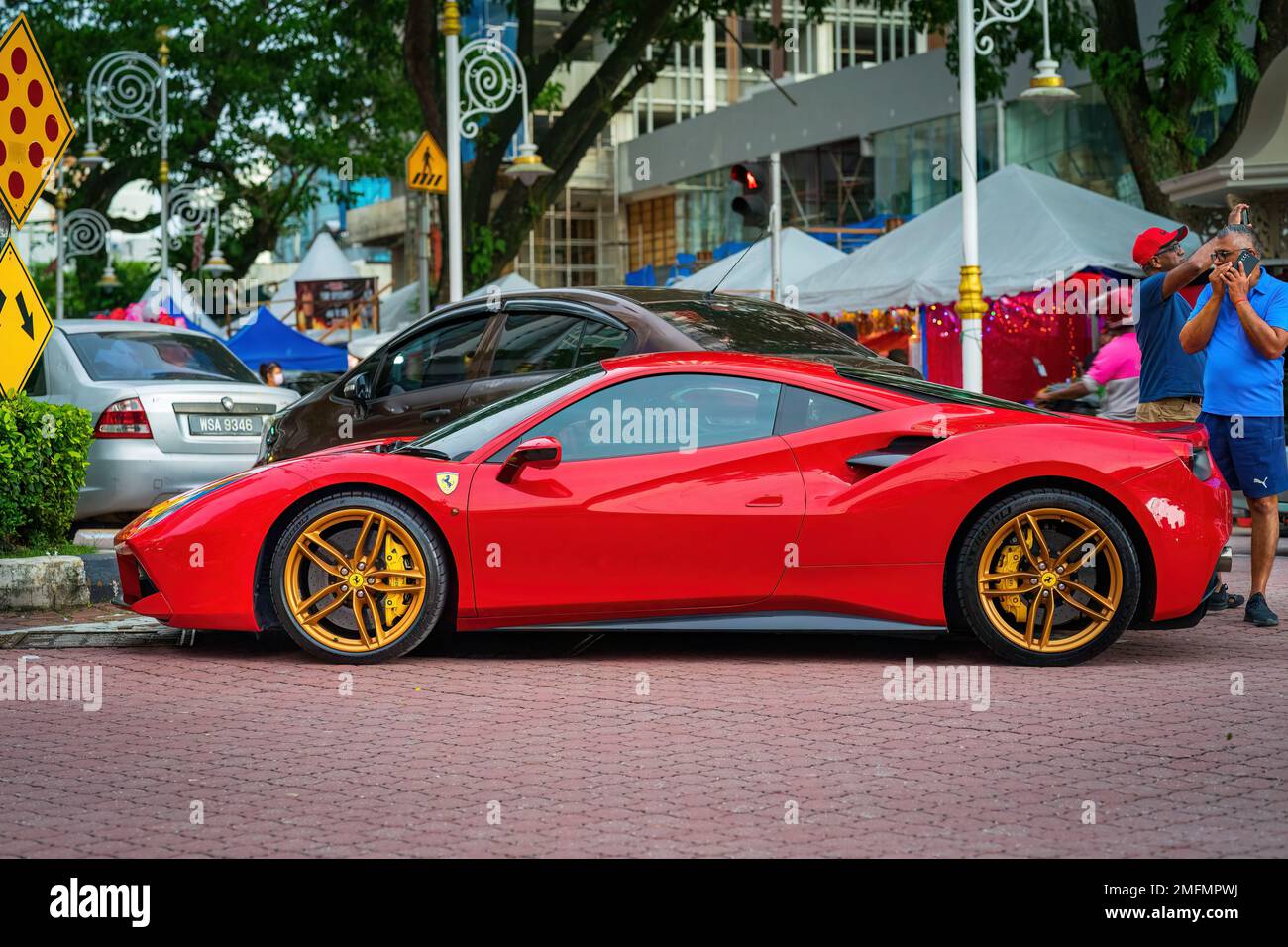 Brickfields, Malaysia - Oct 22, 2022 A red Ferrari 488 GTB parked at ...