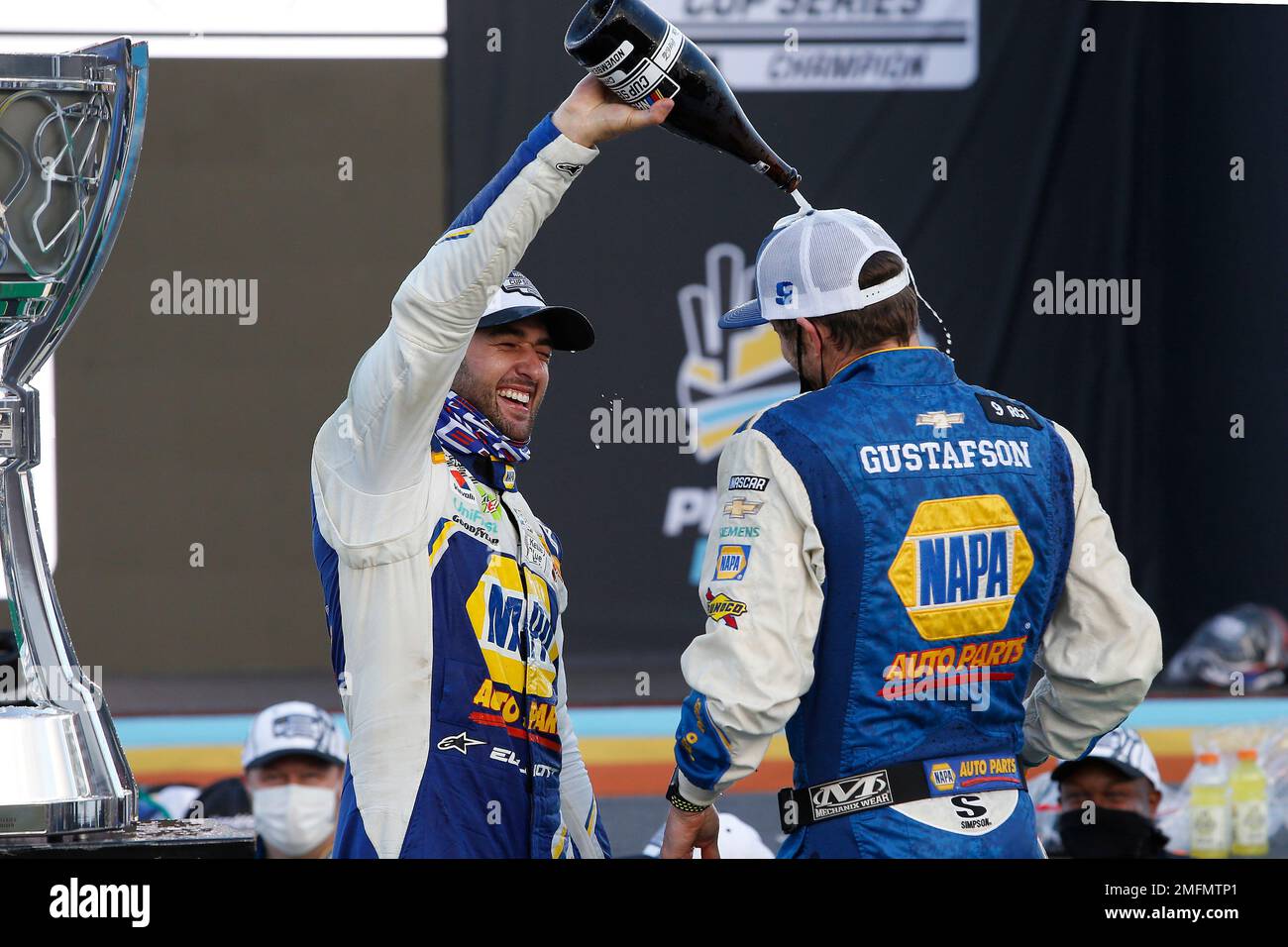 Chase Elliott, left, and pit crew chief Alan Gustafson celebrate their ...