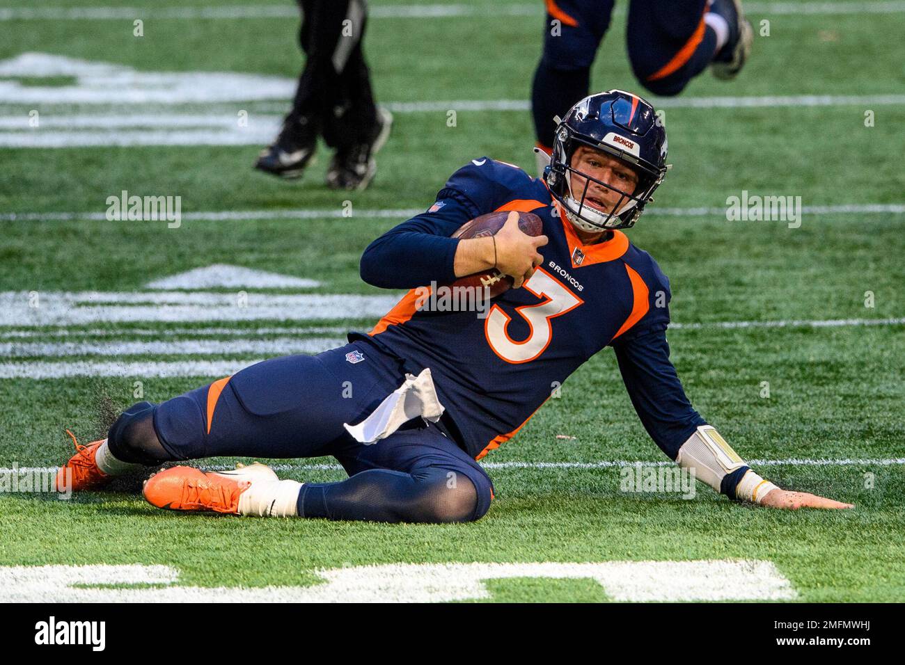 Denver Broncos quarterback Drew Lock (3) slides during the second half ...