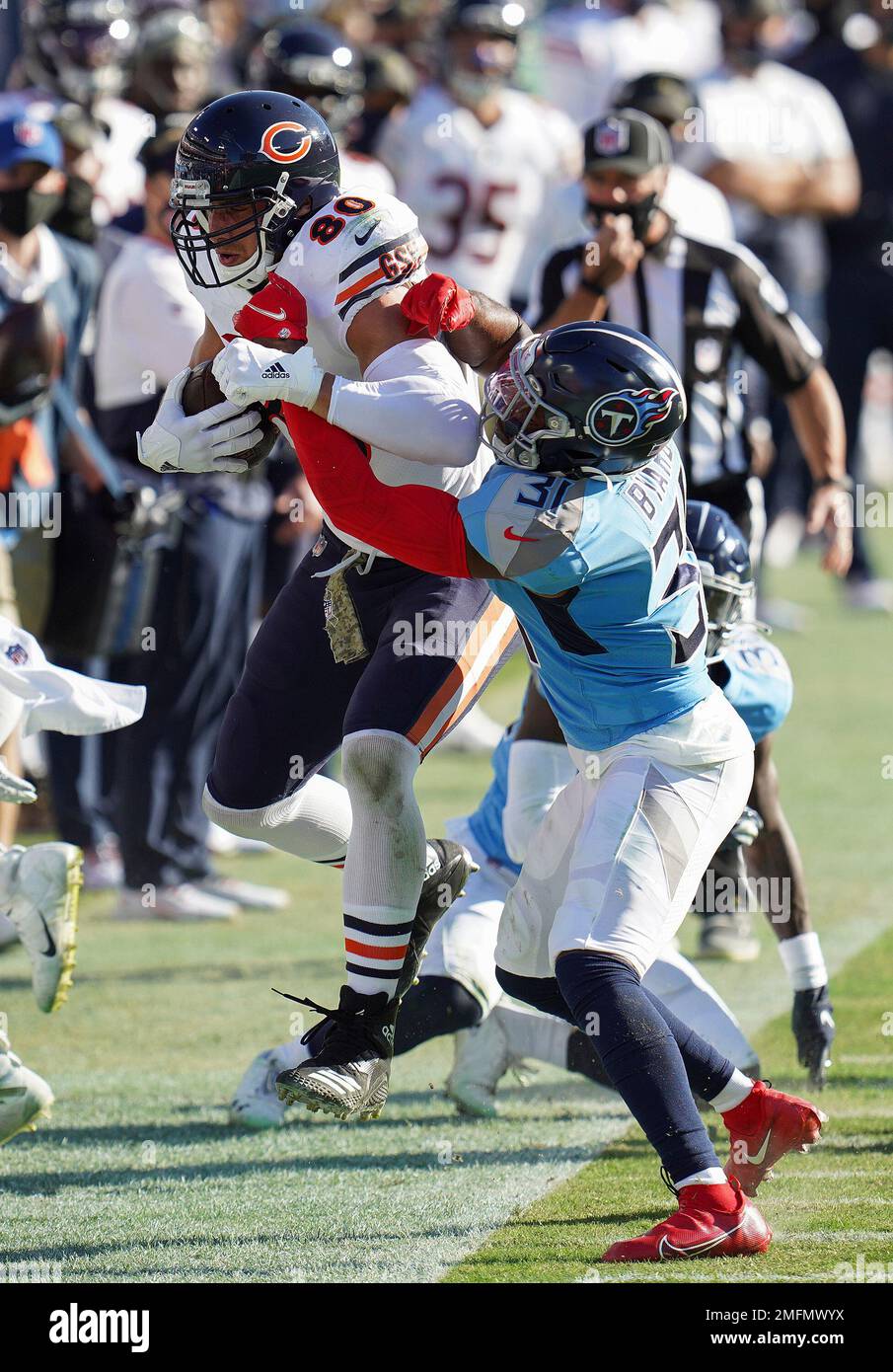 Chicago Bears tight end Jimmy Graham (80) is pushed out of bounds by ...