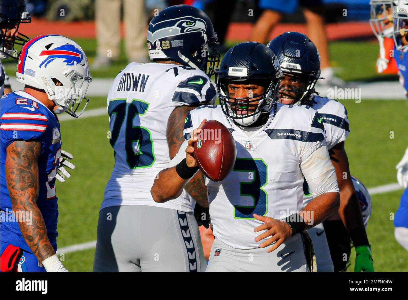 Seattle Seahawks quarterback Russell Wilson (3) reacts after rushing ...