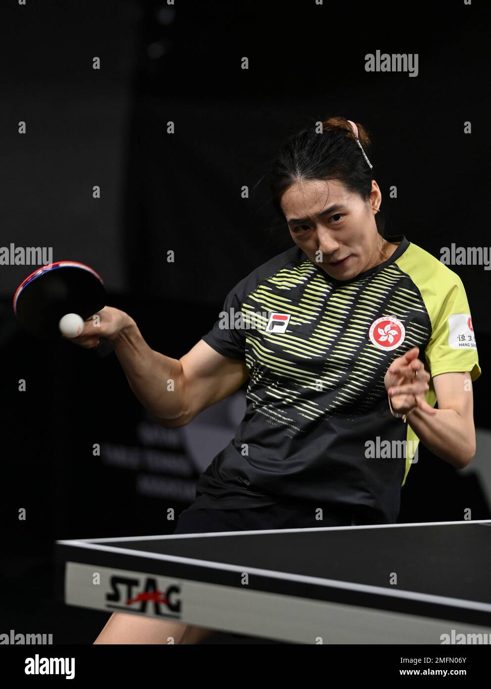 Doha, Qatar. 25th Jan, 2023. Zhu Chengzhu of China's Hong Kong hits a ...