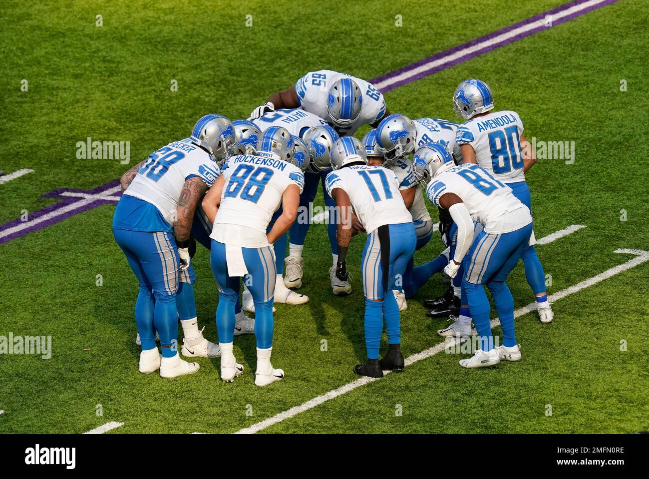 Detroit Lions players huddle during the first half of an NFL football ...