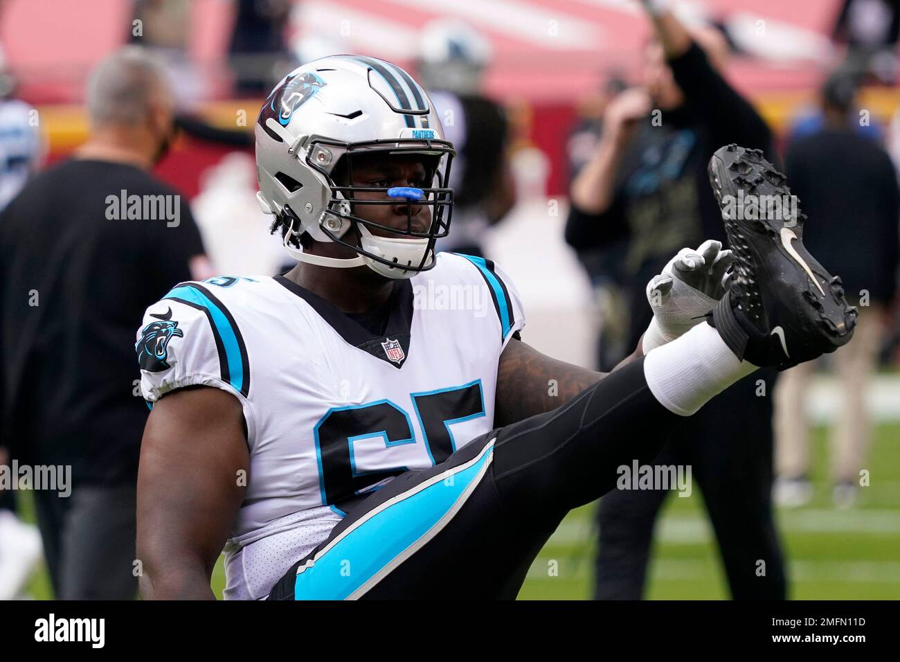 Carolina Panthers offensive guard Dennis Daley (65) warms up before an ...