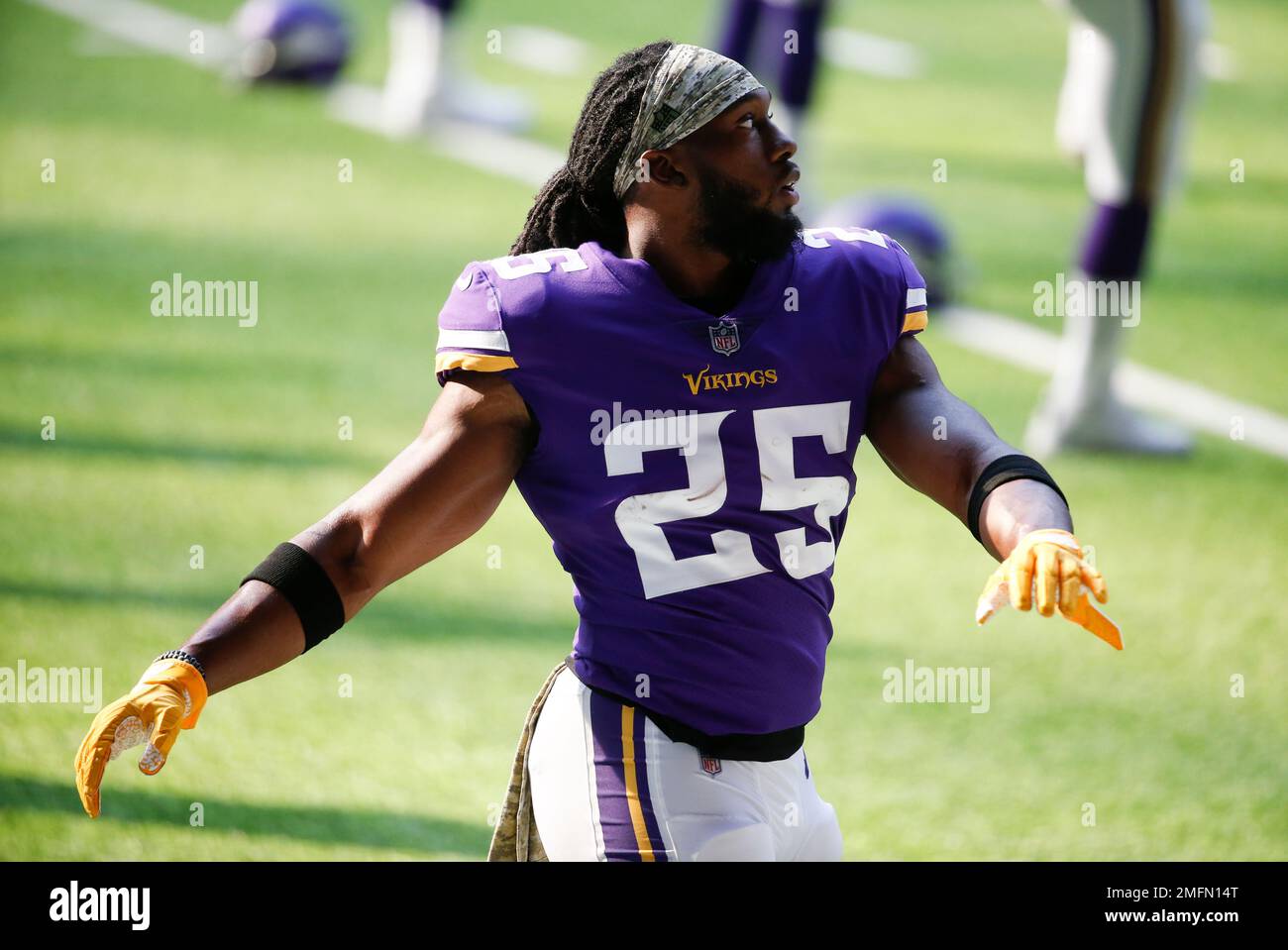 Minnesota Vikings running back Alexander Mattison warms up before an ...