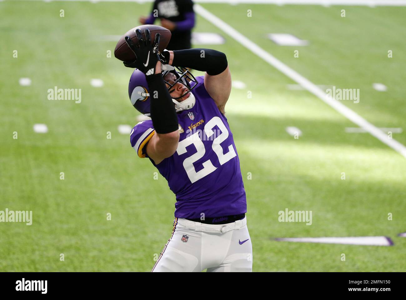 Minnesota Vikings safety Harrison Smith warms up before an NFL football ...