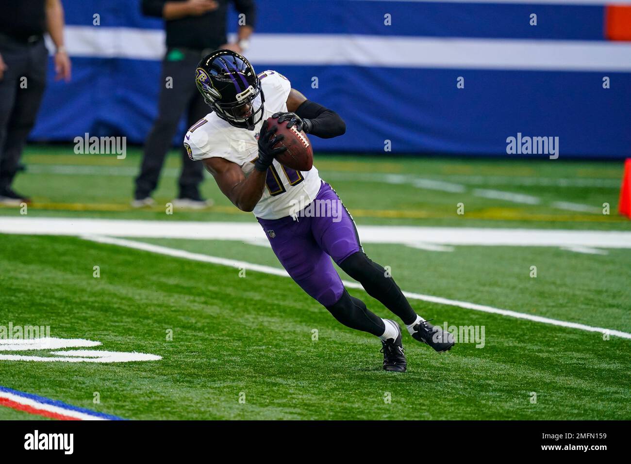 Baltimore Ravens wide receiver James Proche (11) runs after a catch ...