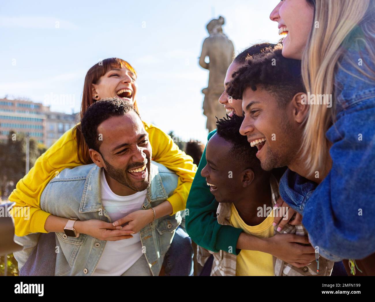 Young group of teenage friends having fun together outdoors Stock Photo - Alamy