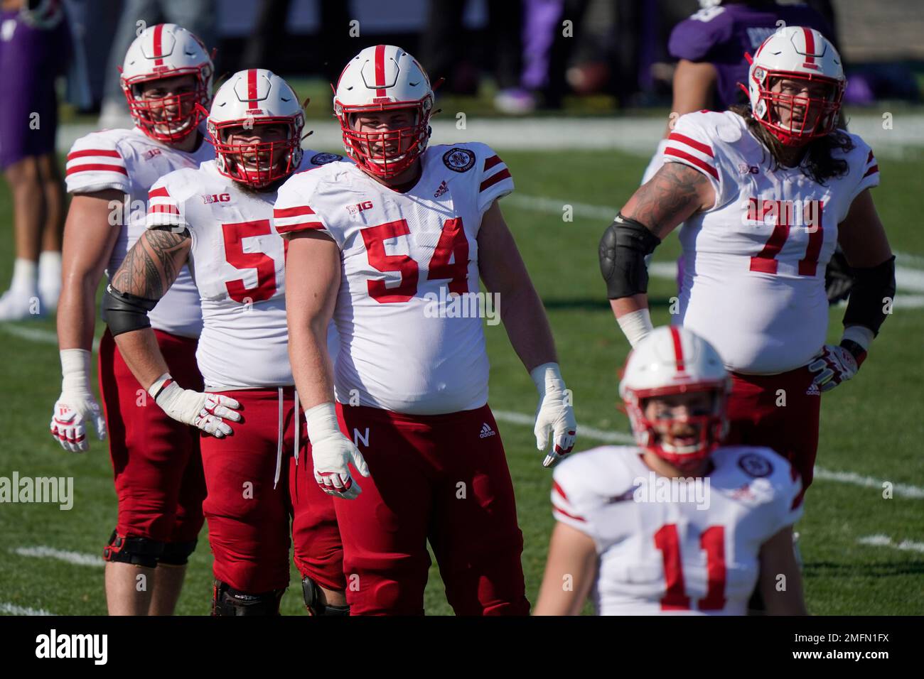 Nebraska offensive lines look at head coach during the first half of an ...