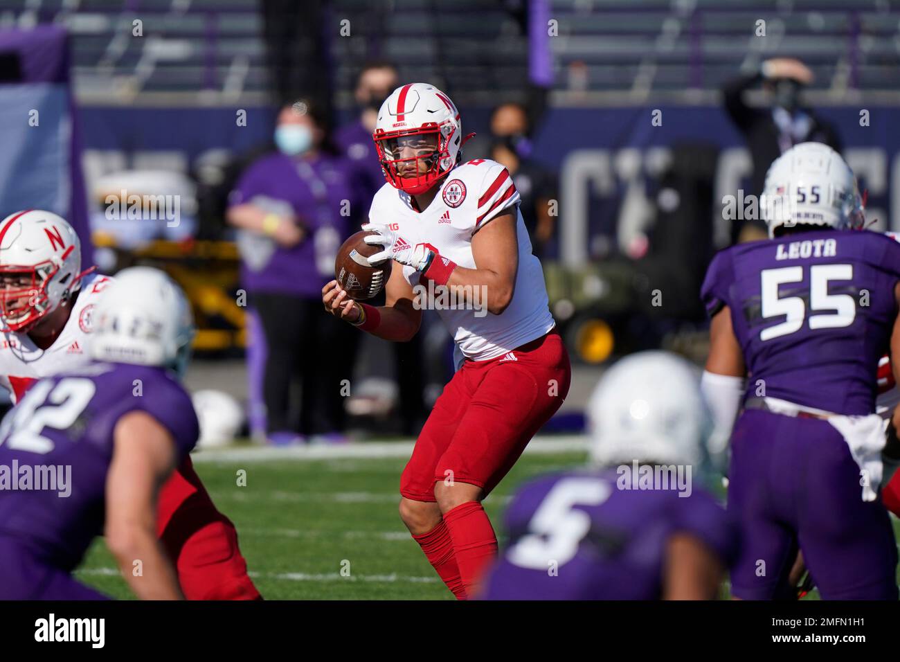 Nebraska quarterback Adrian Martinez controls the ball against ...
