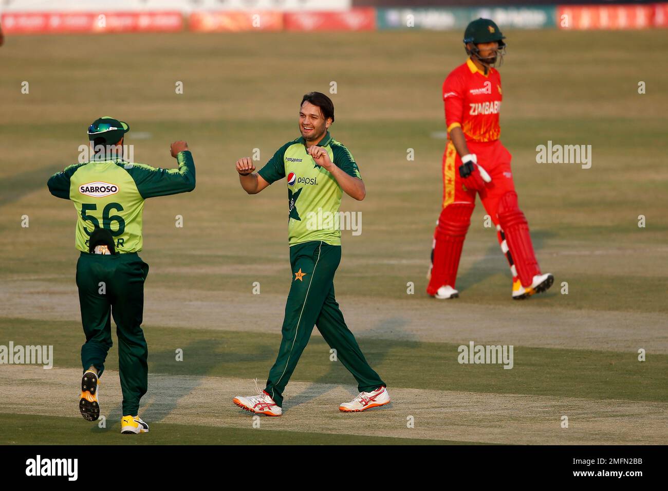 Pakistani spinner Usman Qadir, center, celebrates with teammate Babar ...