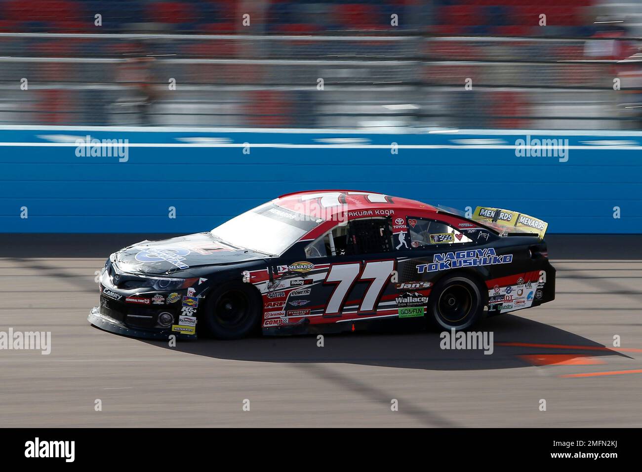 Takuma Koga, of Japan, races through Turn 4 during the ARCA Series auto ...