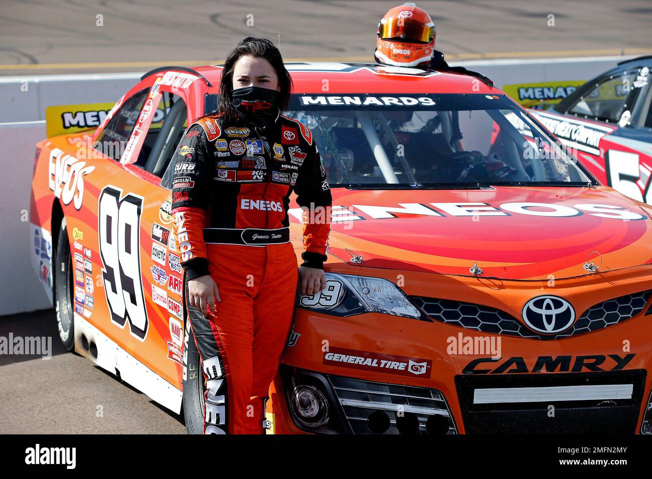 Gracie Trotter stands by her race car on pit road prior to the ARCA ...