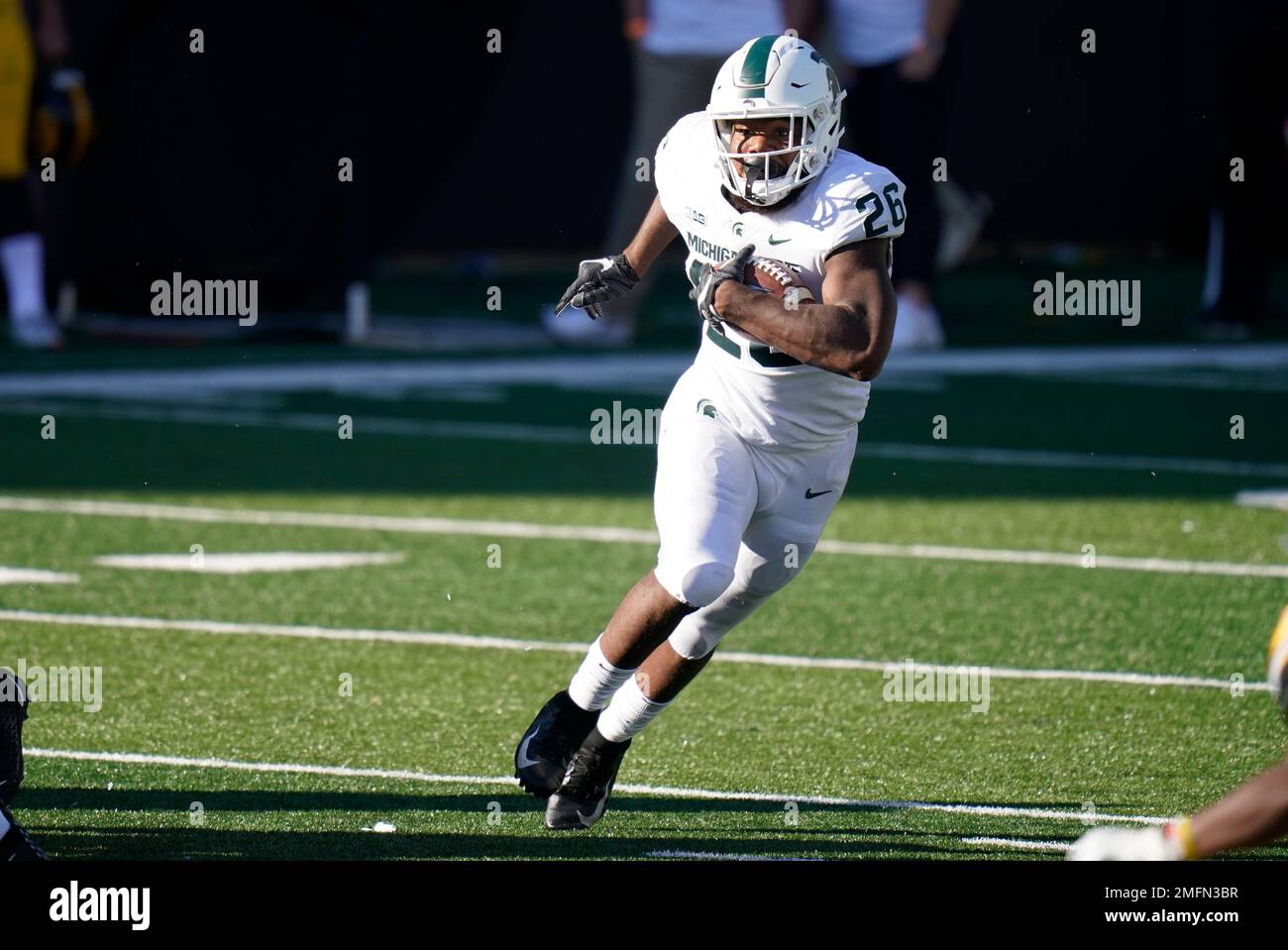 Michigan State running back Brandon Wright carries the ball up field ...