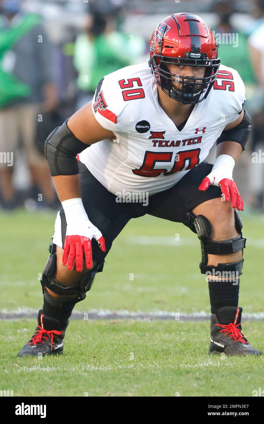 Texas Tech offensive lineman Josh Burger (50) looks on against TCU during the first half of an ...
