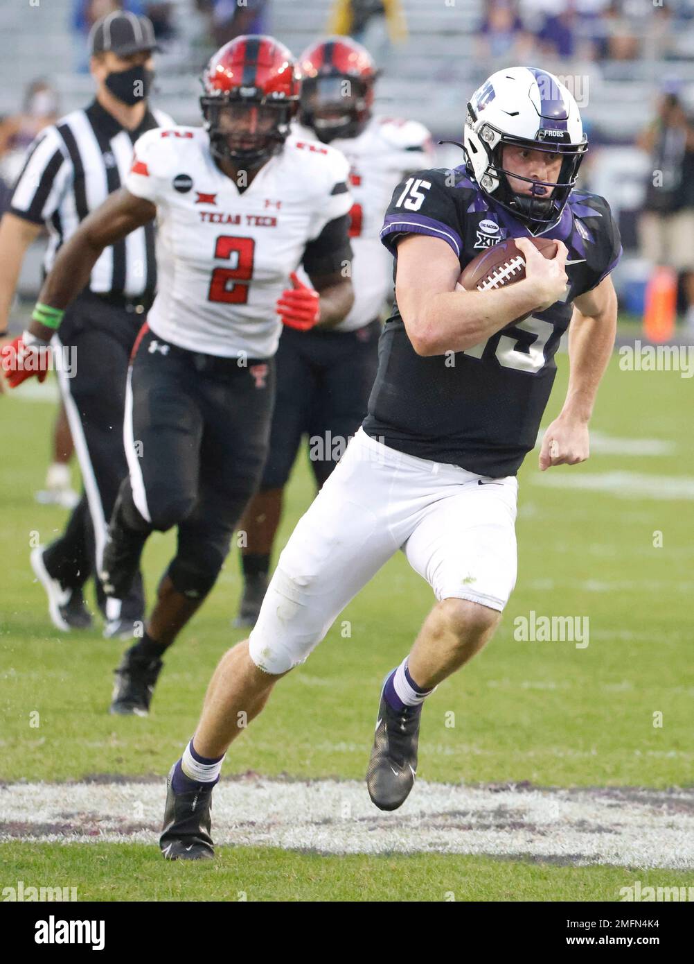 TCU quarterback Max Duggan (15) takes off past Texas Tech linebacker ...