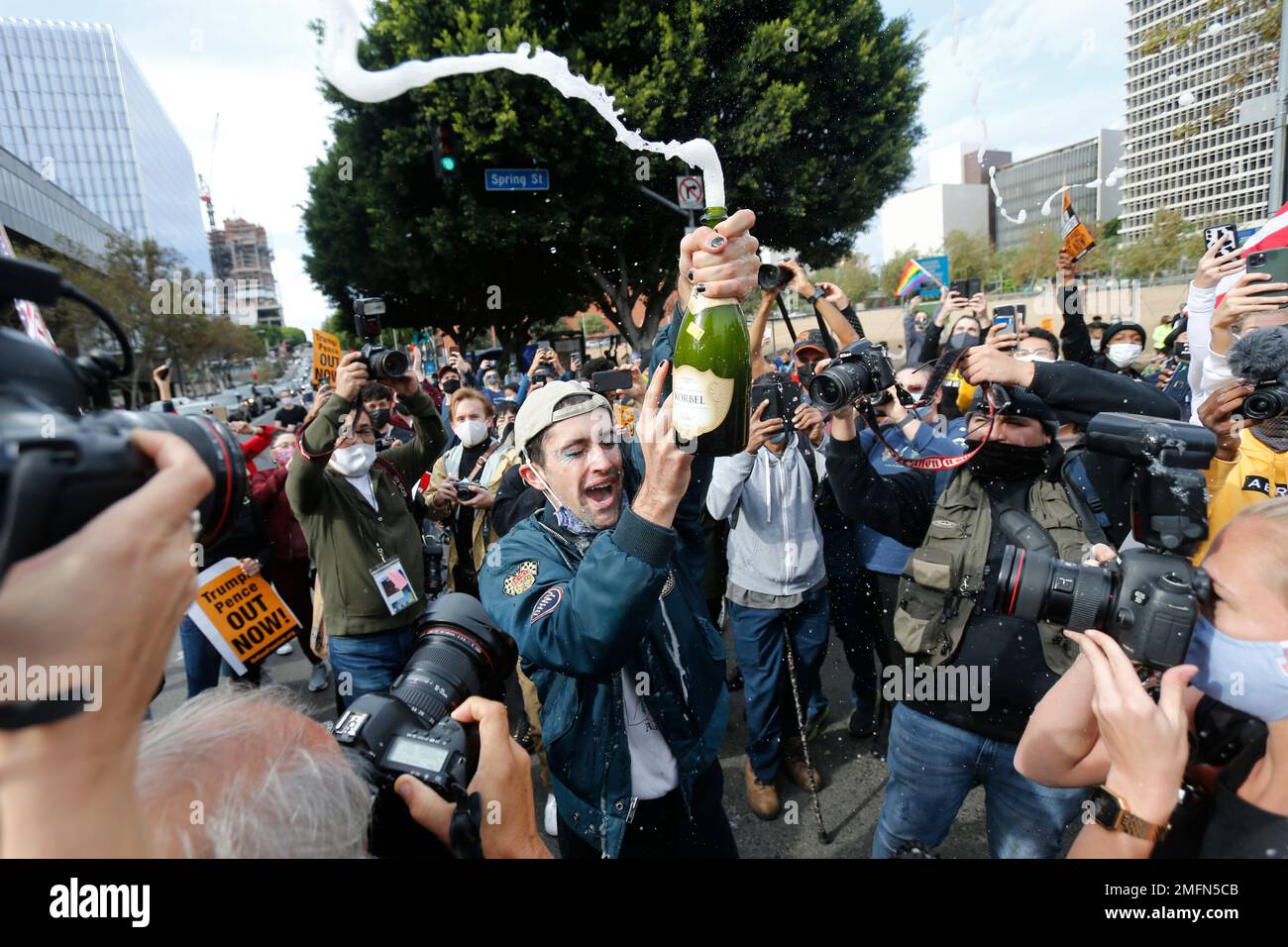 People celebrate the victory of President-elect Joe Biden and Vice ...