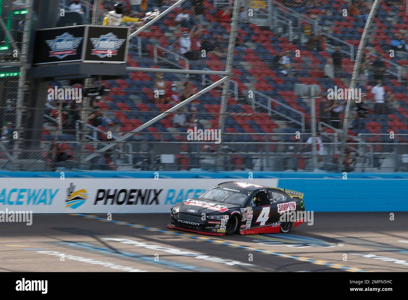 David Gilliland (4) crosses the finish line to win an ARCA Series auto ...
