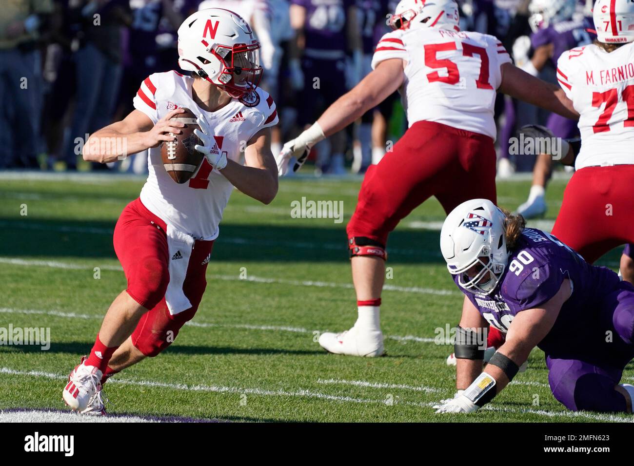Nebraska quarterback Luke McCaffrey, left, looks to pass during the ...
