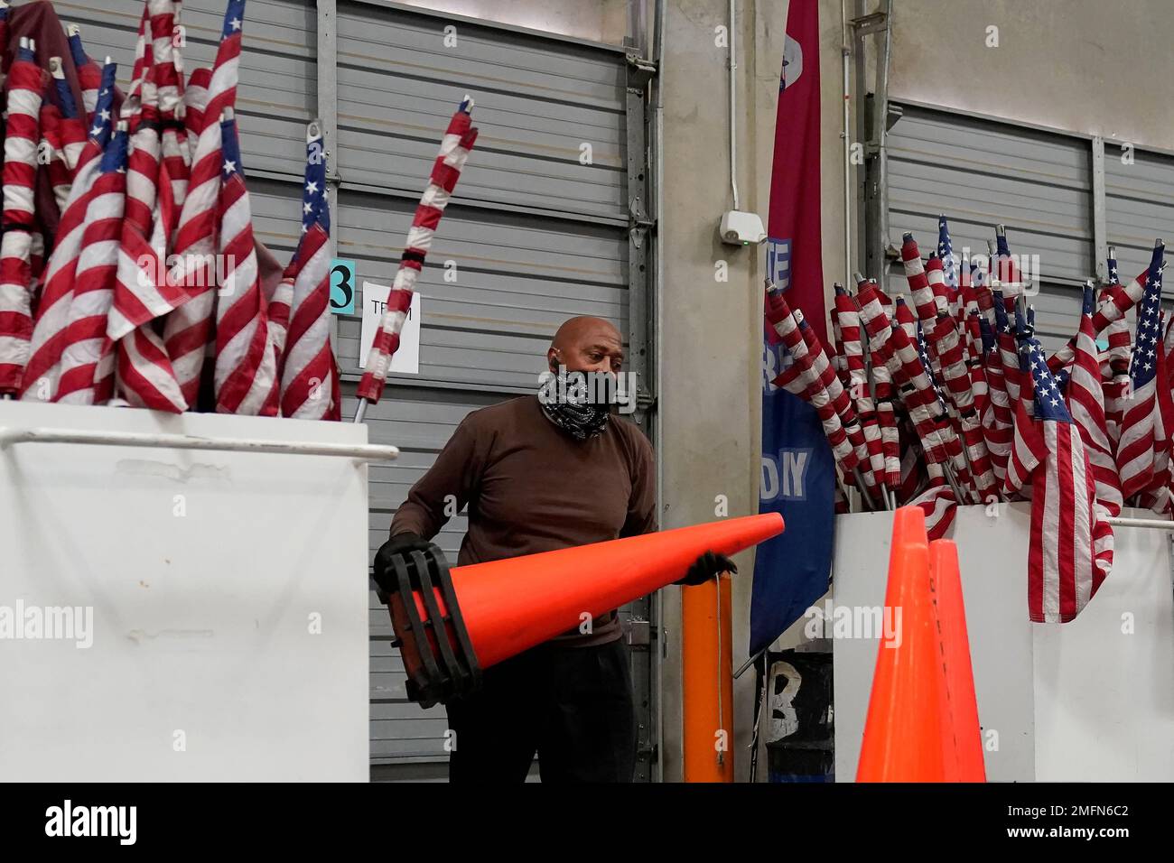 An elections worker packs up polling equipment at the Clark County ...