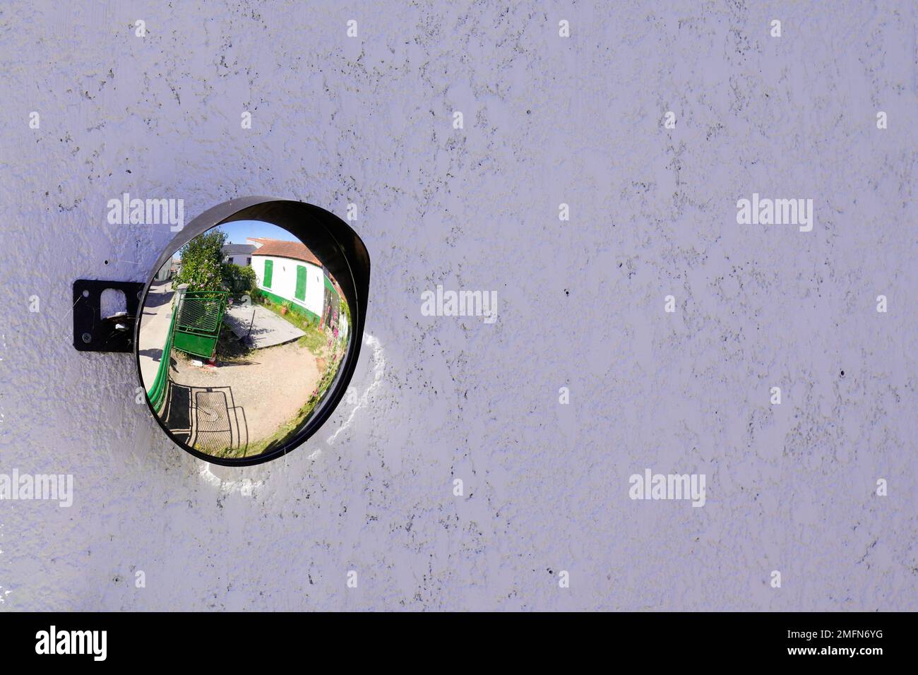 street traffic wall convex mirror in road safety concept in city center ...