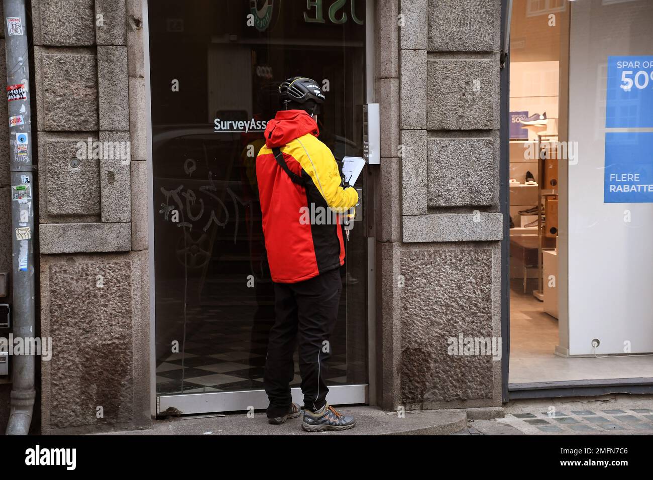 Copenhagen/Denmark/25 January 2023/ German DHL parcel bike delivery in ...