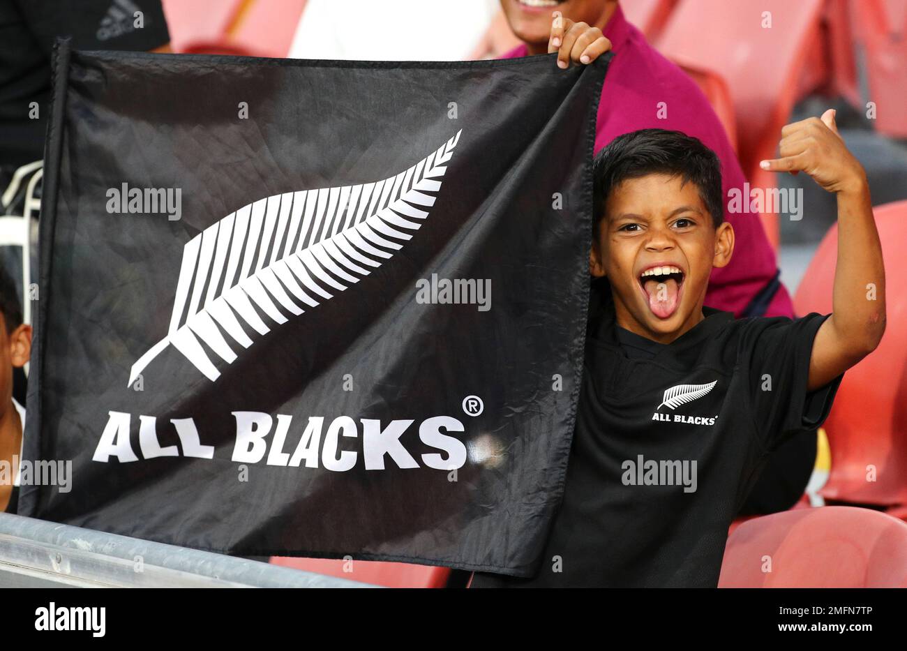 A young All Blacks fan gestures ahead of the Bledisloe rugby test ...