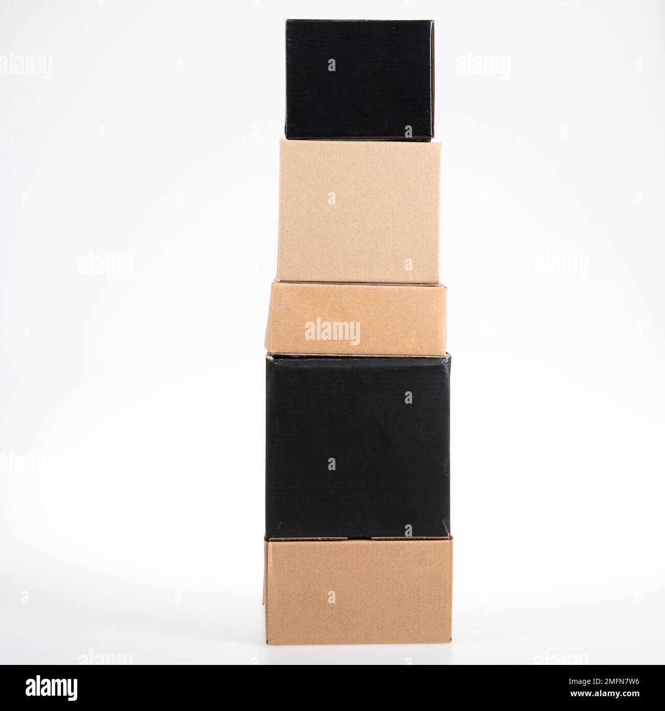 pile of cardboard boxes in pyramid on white background Stock Photo - Alamy