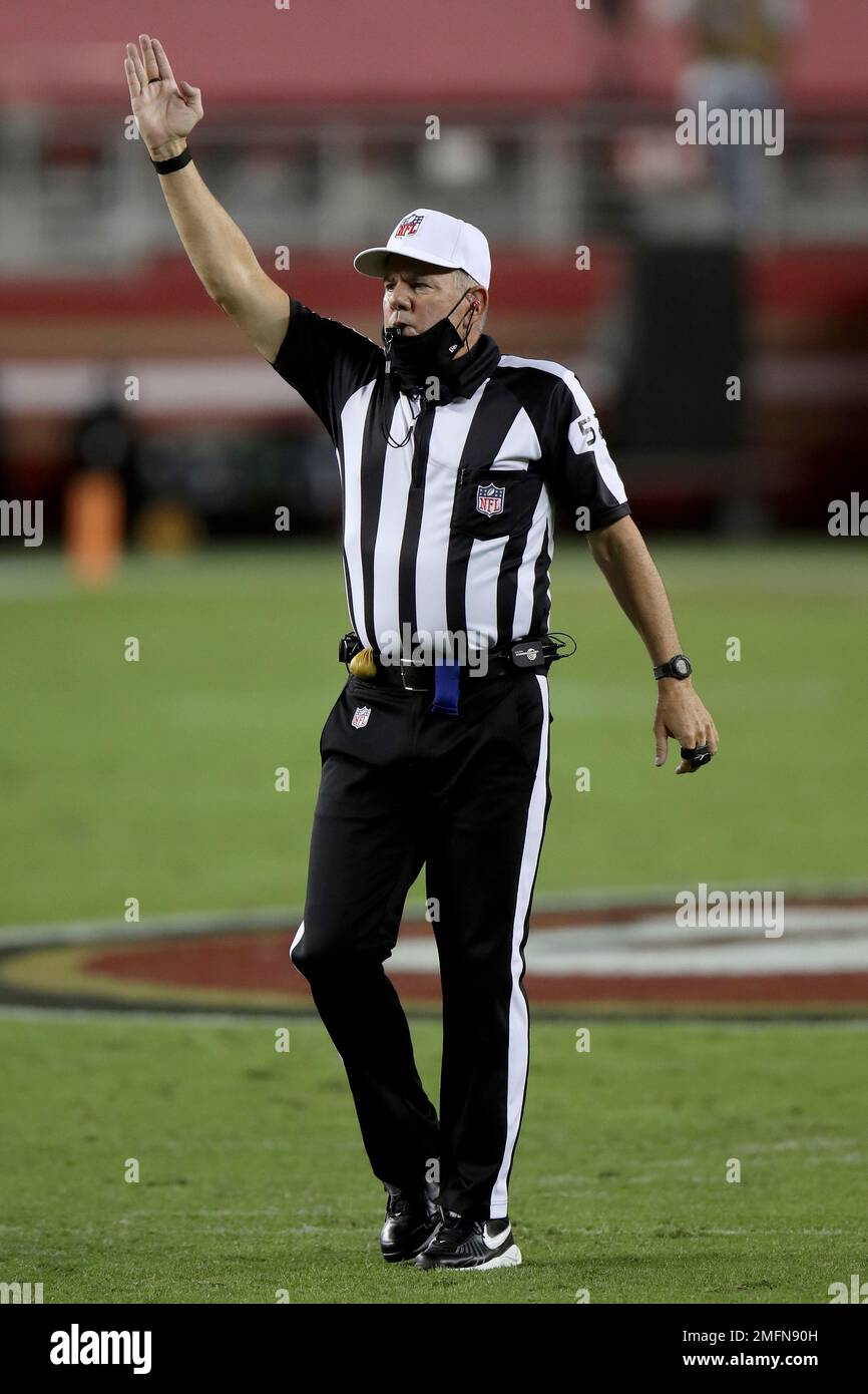 Referee Bill Vinovich (52) in action during an NFL football game ...