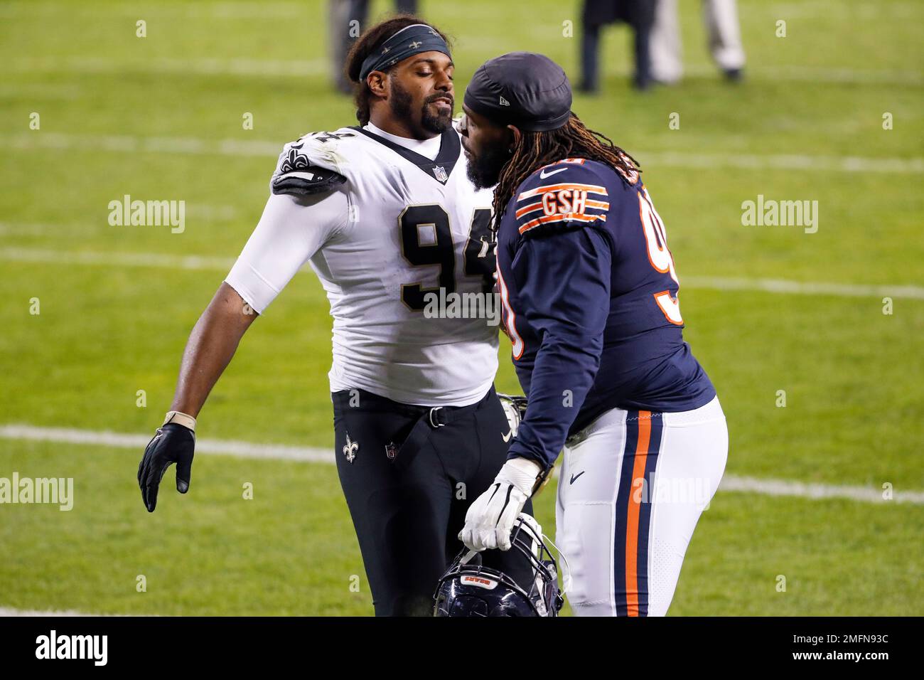 New Orleans Saints defensive end Cameron Jordan (94) hugs Chicago Bears ...