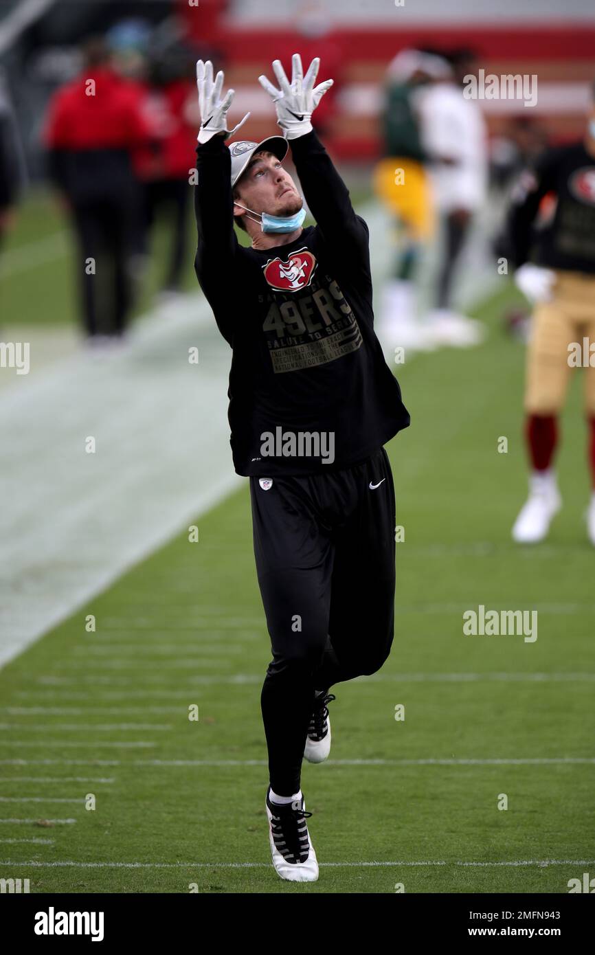 San Francisco 49ers tight end Ross Dwelley (82) warms up before an NFL ...