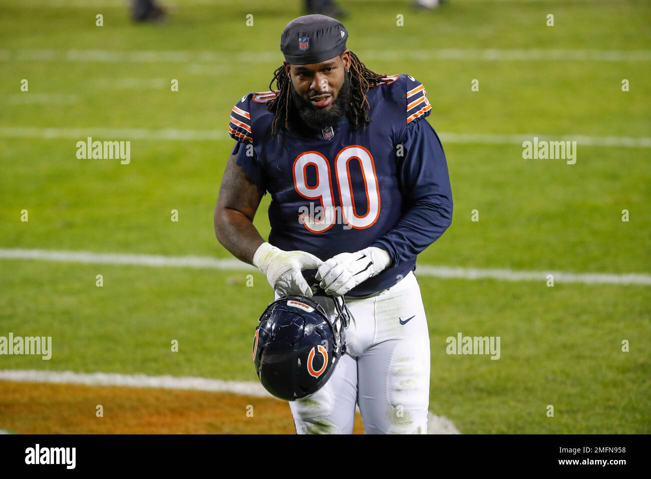 Chicago Bears defensive tackle John Jenkins (90) walks off the field ...